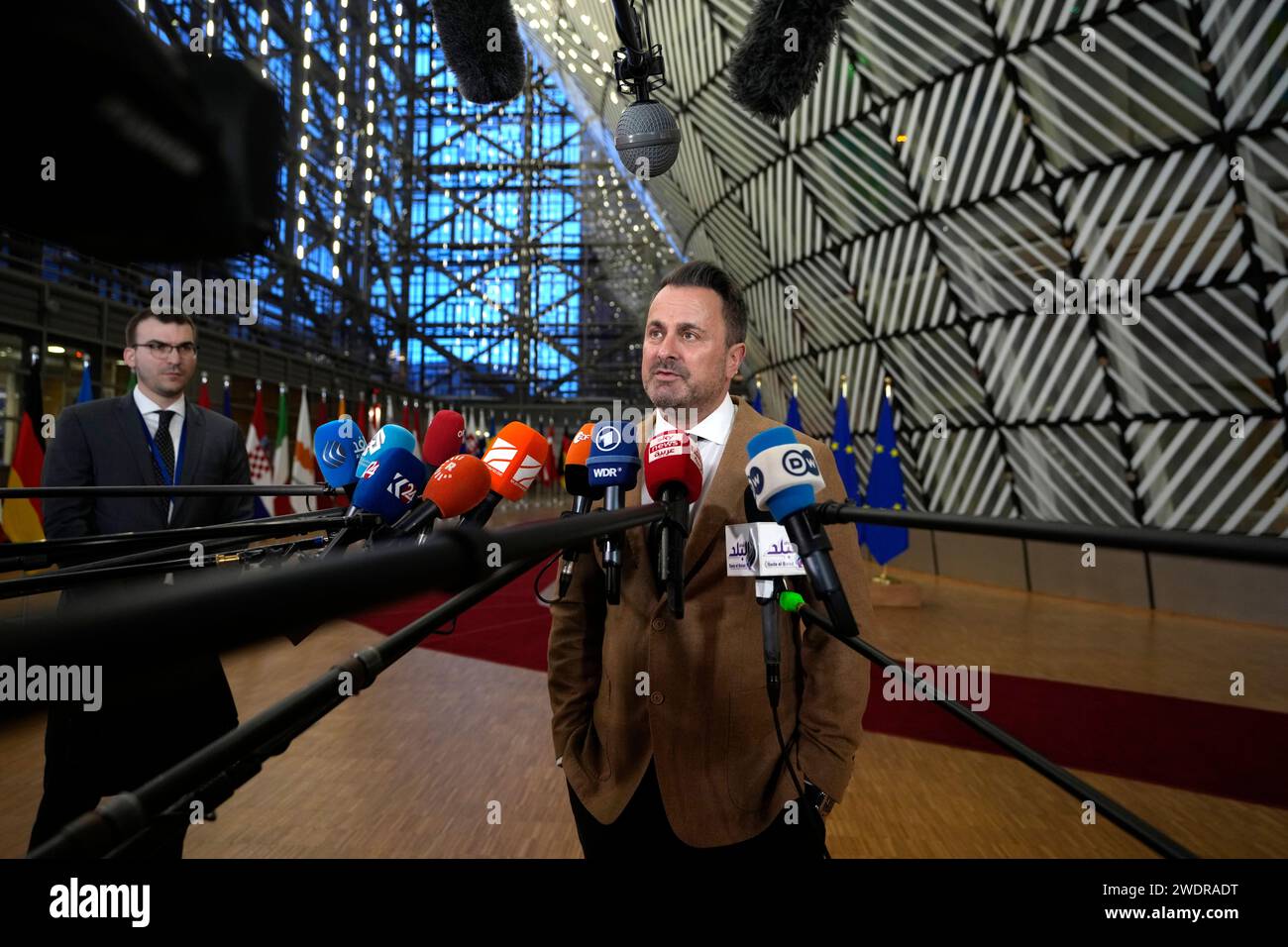 Luxembourg's Foreign Minister Xavier Bettel speaks with the media as he ...