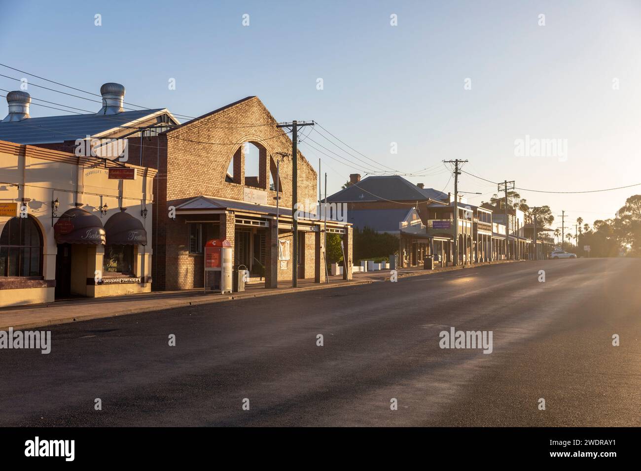 Mudgee town centre, sunrise dawn morning in summer creates hazy mist ...