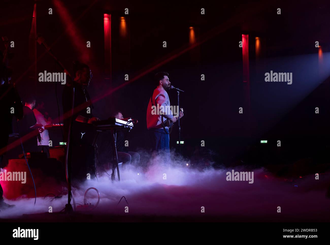 Tehran, Iran. 21st Jan, 2024. Iranian singer, Ali Yasini (C), is ...