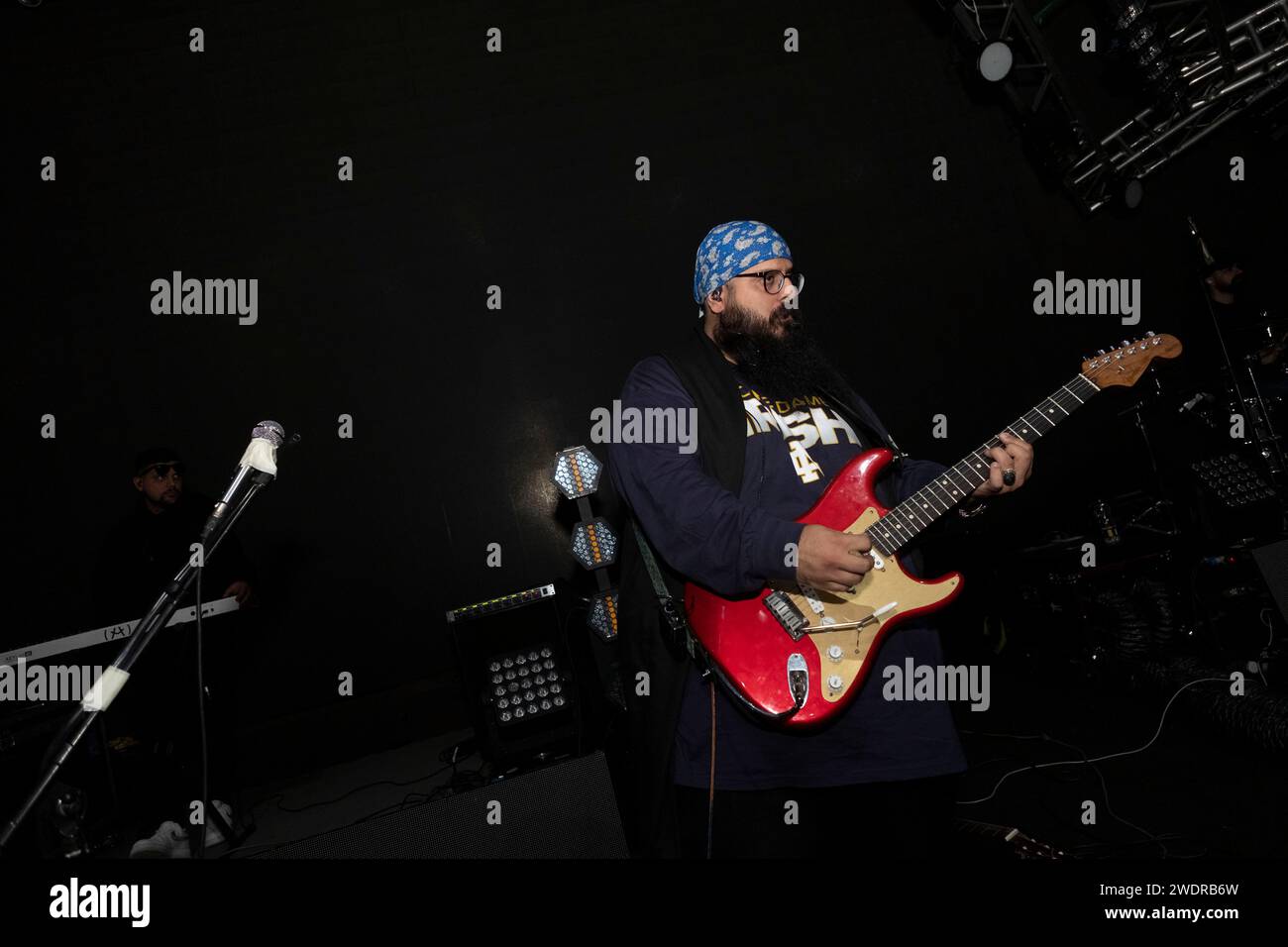 Tehran, Iran. 21st Jan, 2024. An Iranian musician is playing the guitar ...