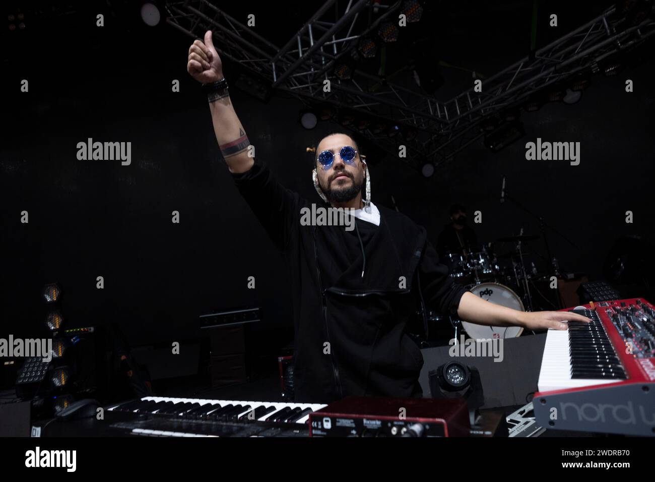 Tehran, Iran. 21st Jan, 2024. An Iranian musician is checking a musical ...