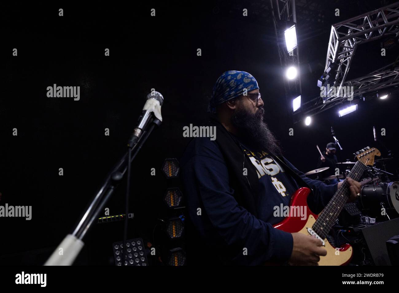 Tehran, Iran. 21st Jan, 2024. An Iranian musician is playing the guitar ...