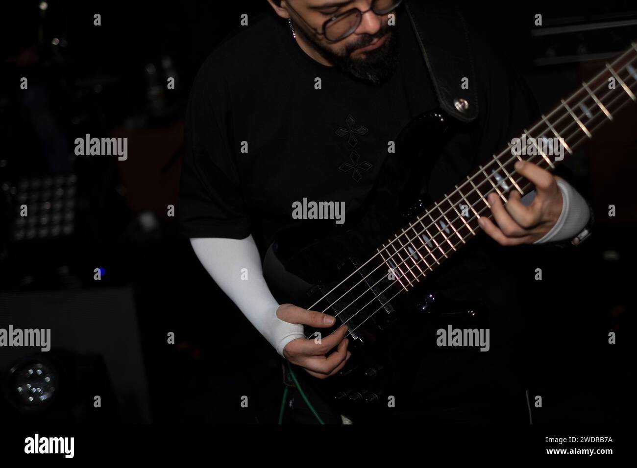 Tehran, Iran. 21st Jan, 2024. An Iranian musician is playing the guitar ...