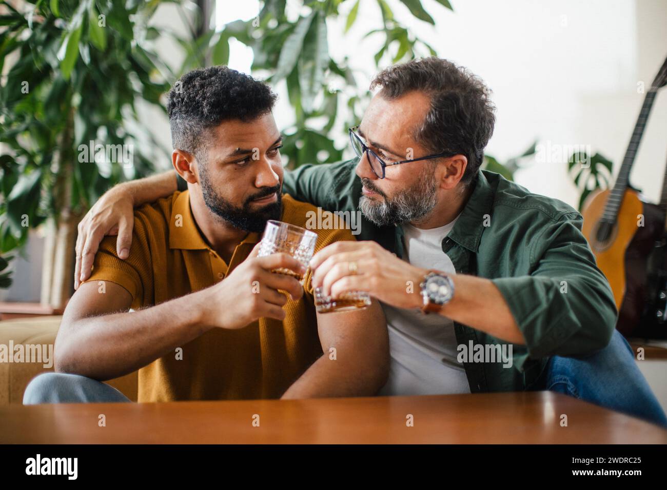 Best friends, supporting each other, drinking whiskey and talking ...