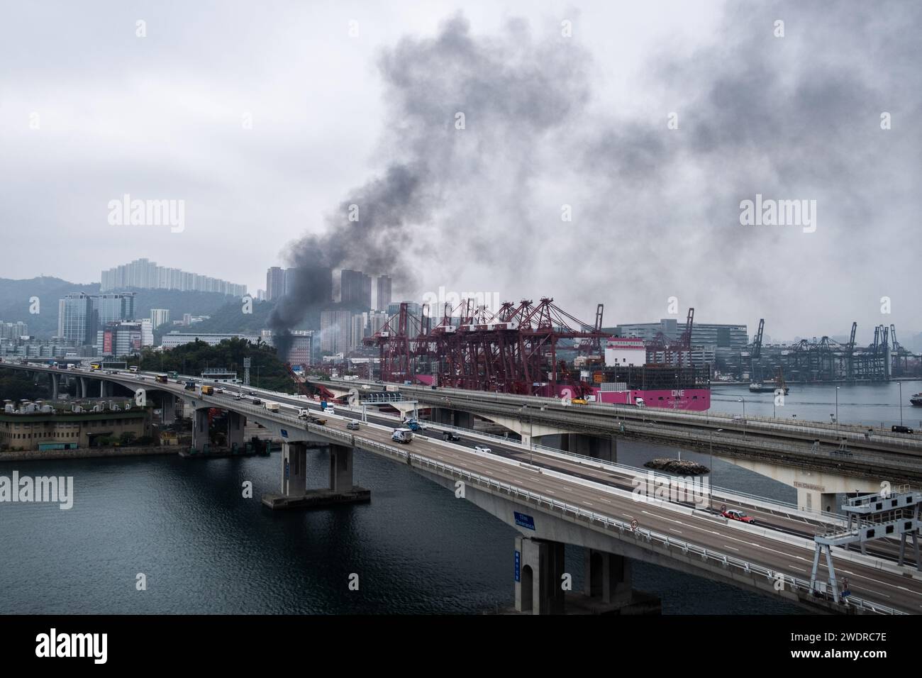 Hong Kong, China. 22nd Jan, 2024. Dense smoke seen at Modern Terminals on Container Port Road in ...