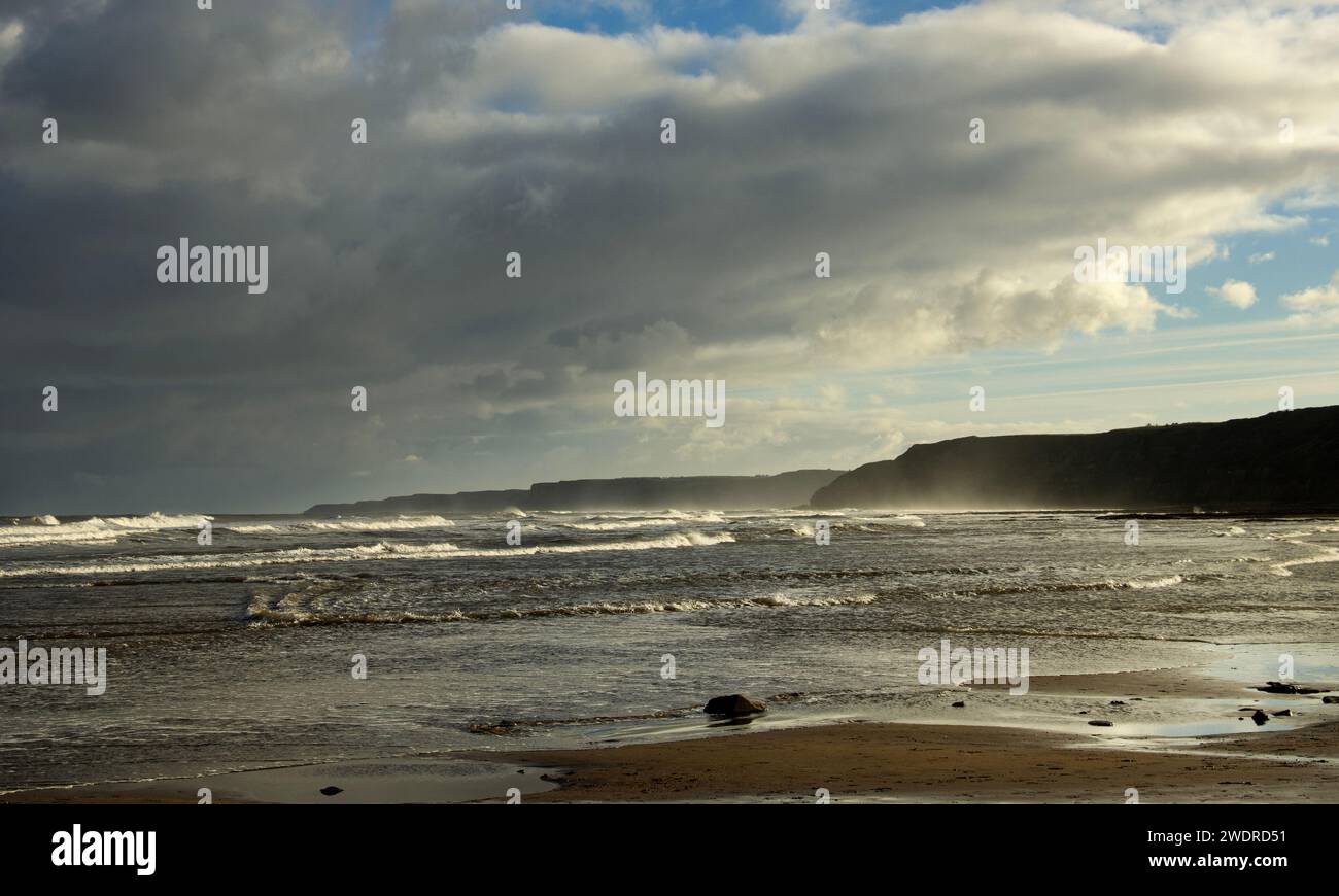 Waves stirred up by a north-easterly storm pound the coast south of ...