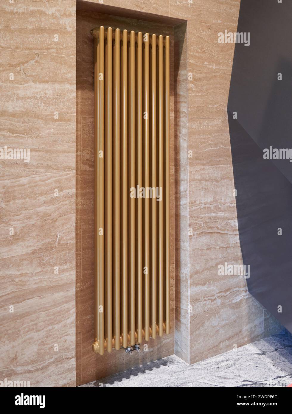 Modern vertical wall mounted heating radiator Stock Photo - Alamy