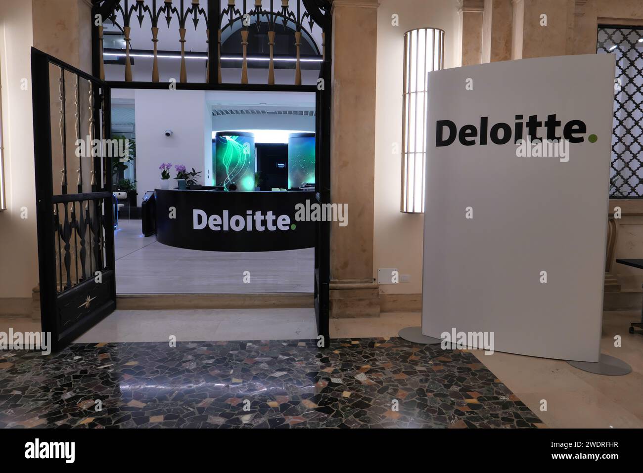Sign deloitte hi-res stock photography and images - Alamy