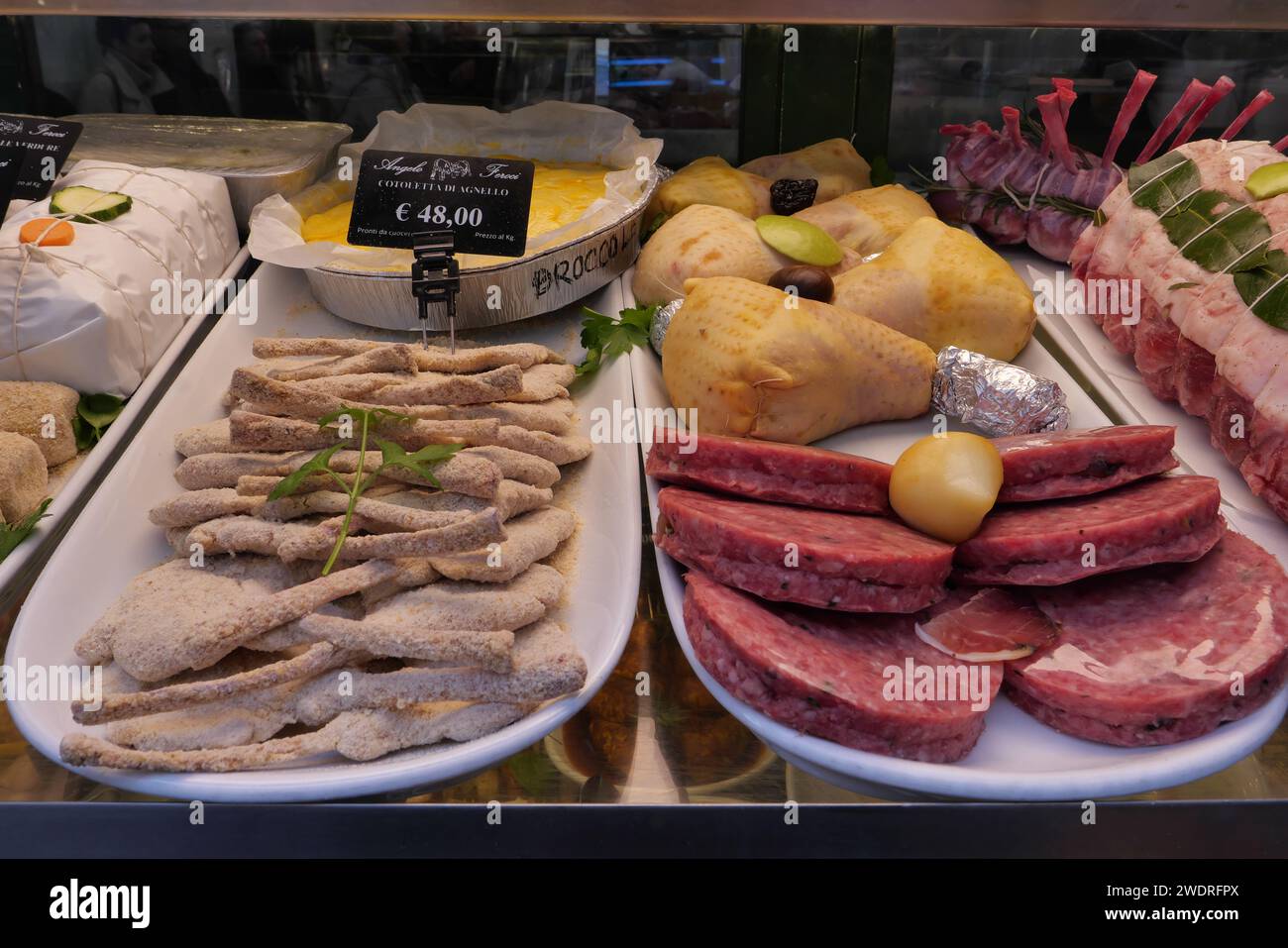 HANDMADE MEAT DISHES ON DISPLAY INSIDE THE FEROCI MEAT SHOP. FEROCI IS ...