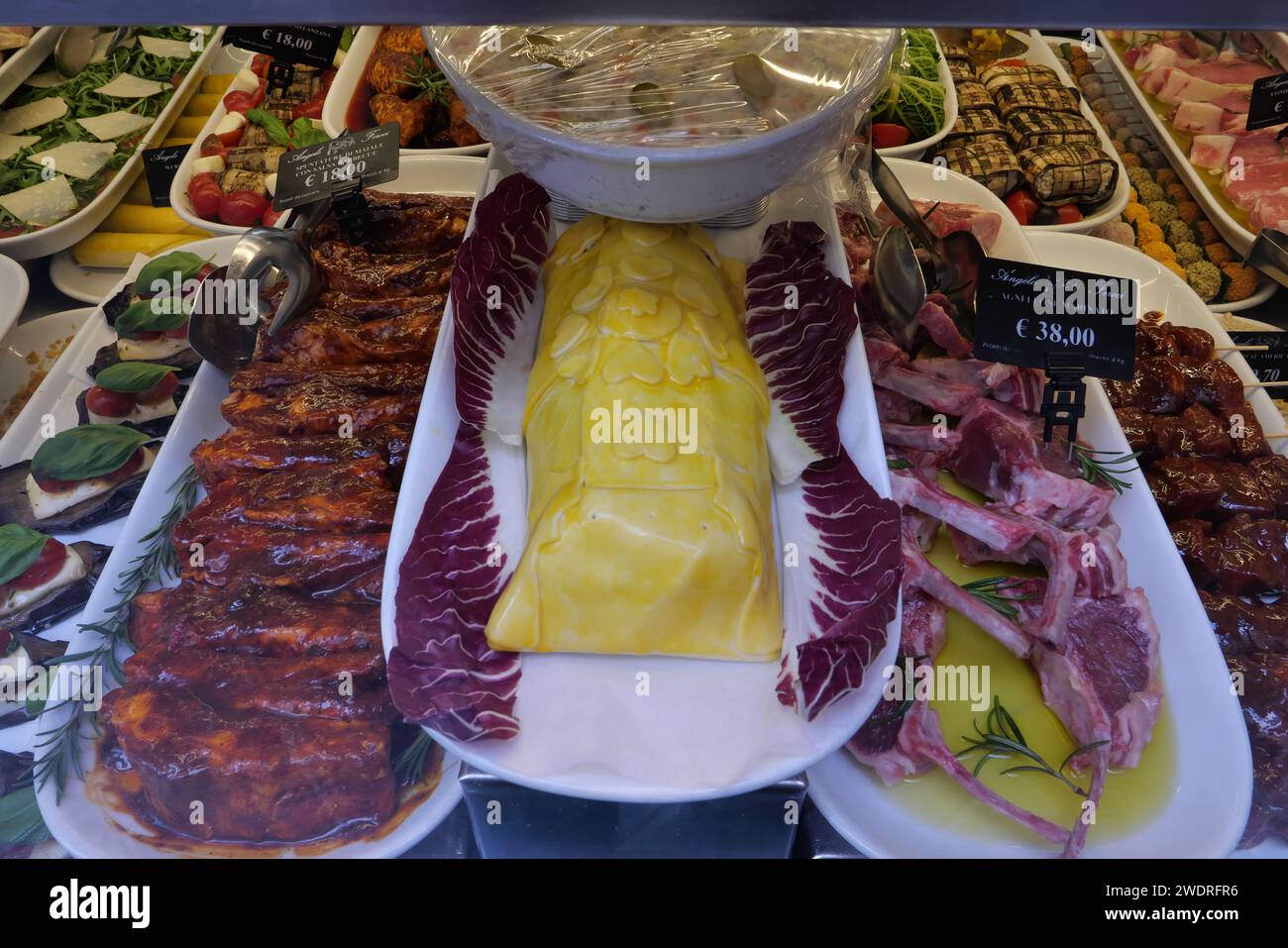 HANDMADE MEAT DISHES ON DISPLAY INSIDE THE FEROCI MEAT SHOP. FEROCI IS ...