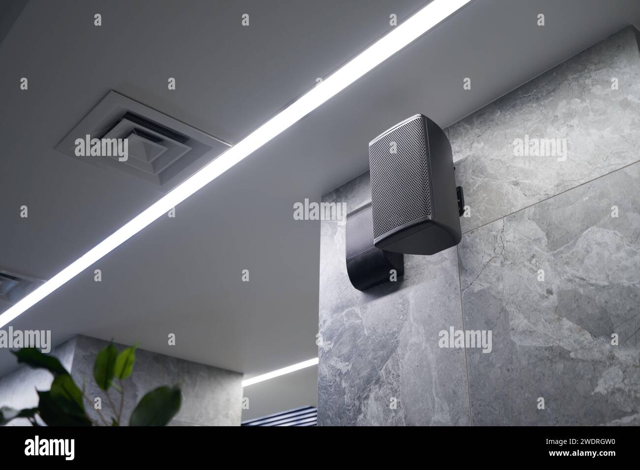 Black wall speaker installed in building sound system Stock Photo - Alamy
