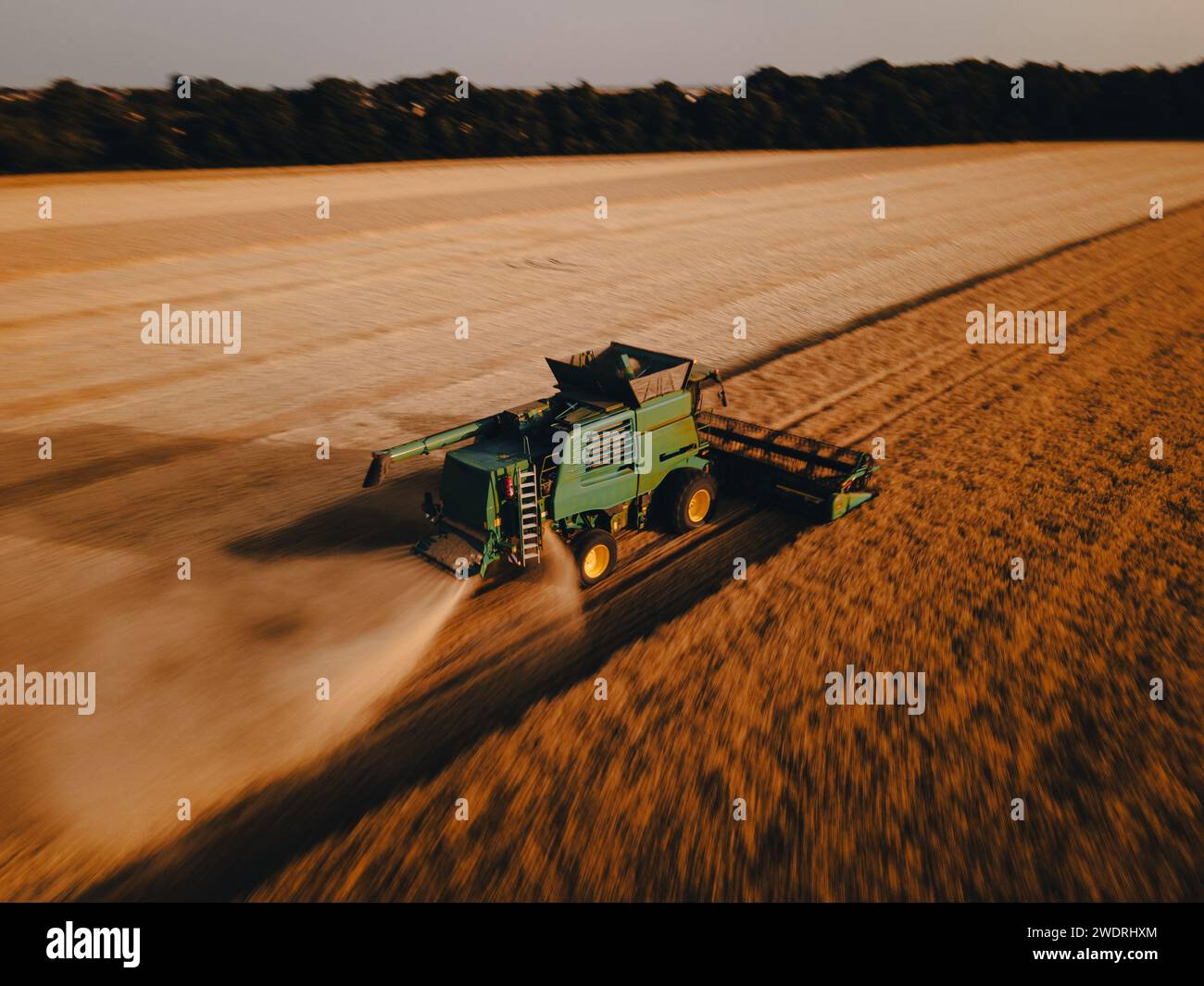 Harvester in operation hi-res stock photography and images - Alamy