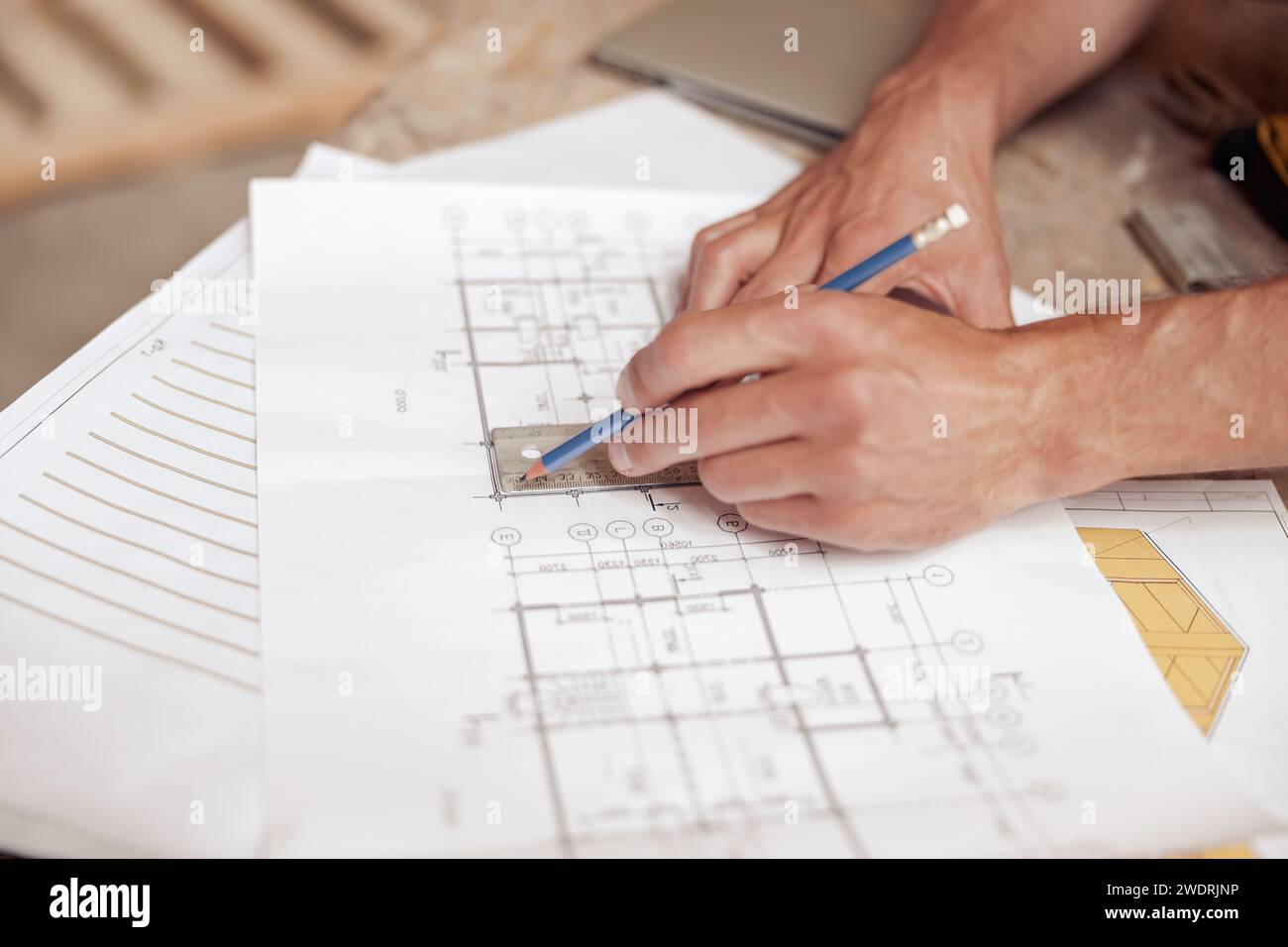 Male architect hands drawing architectural building plan Stock Photo ...