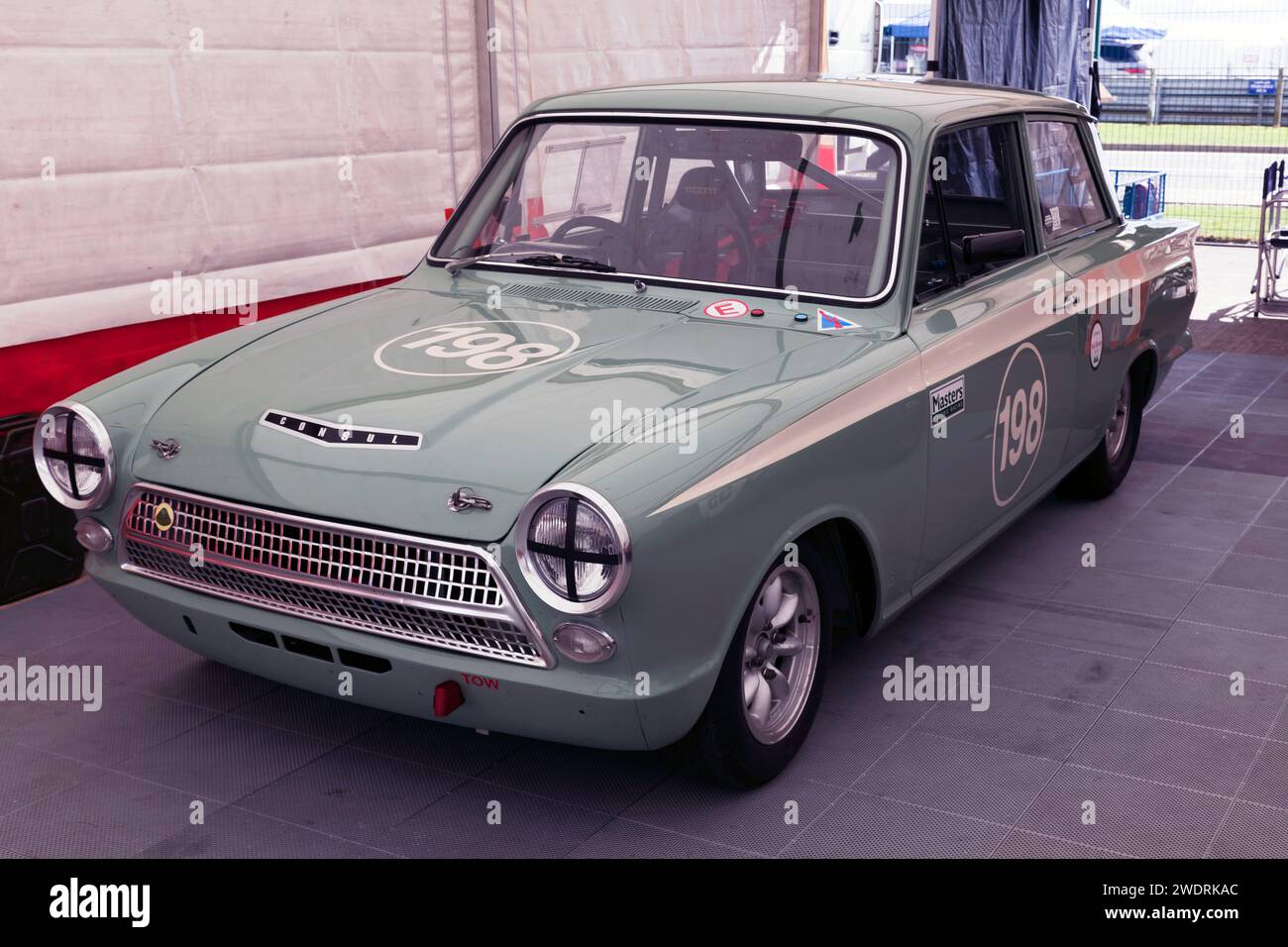 Three-quarters front view of Pattle and Burton's, Mk1, Green, 1963 ...