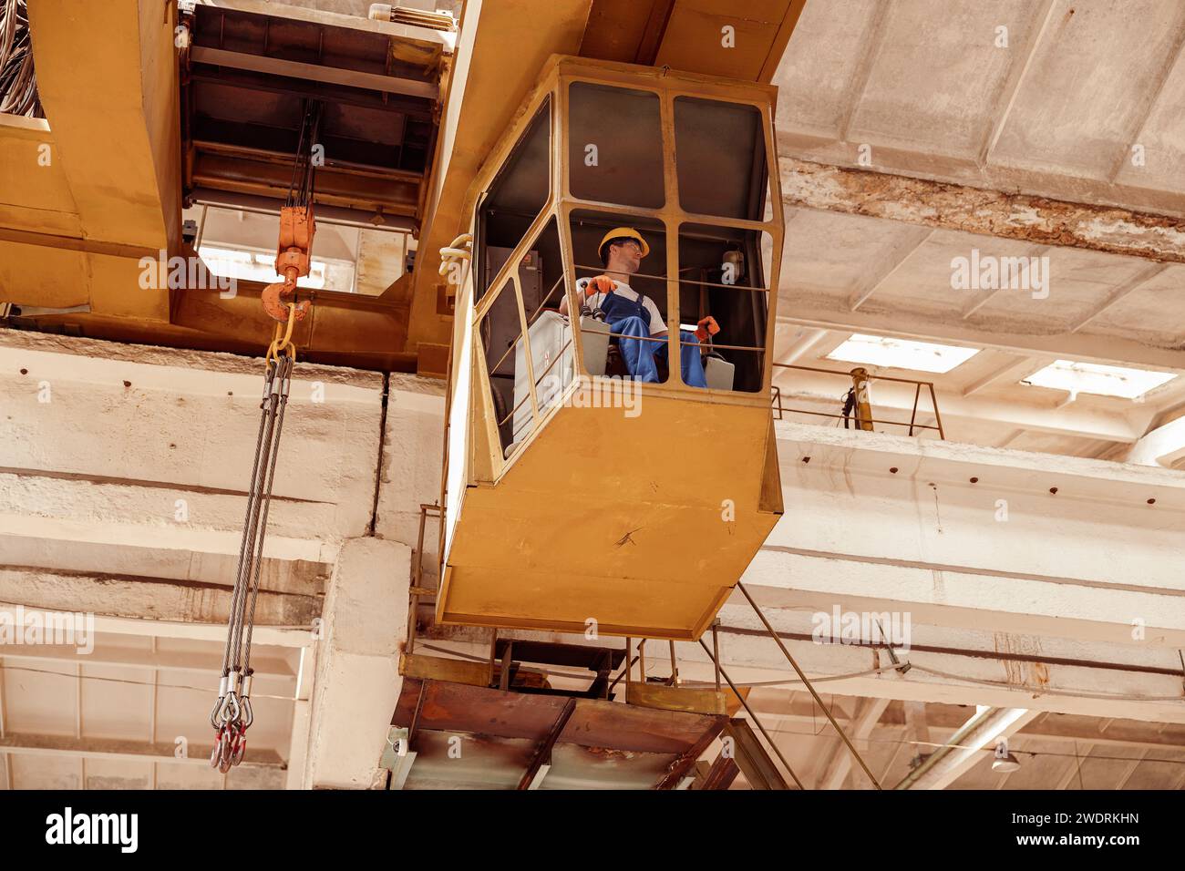 Sitting crane operator hi-res stock photography and images - Alamy