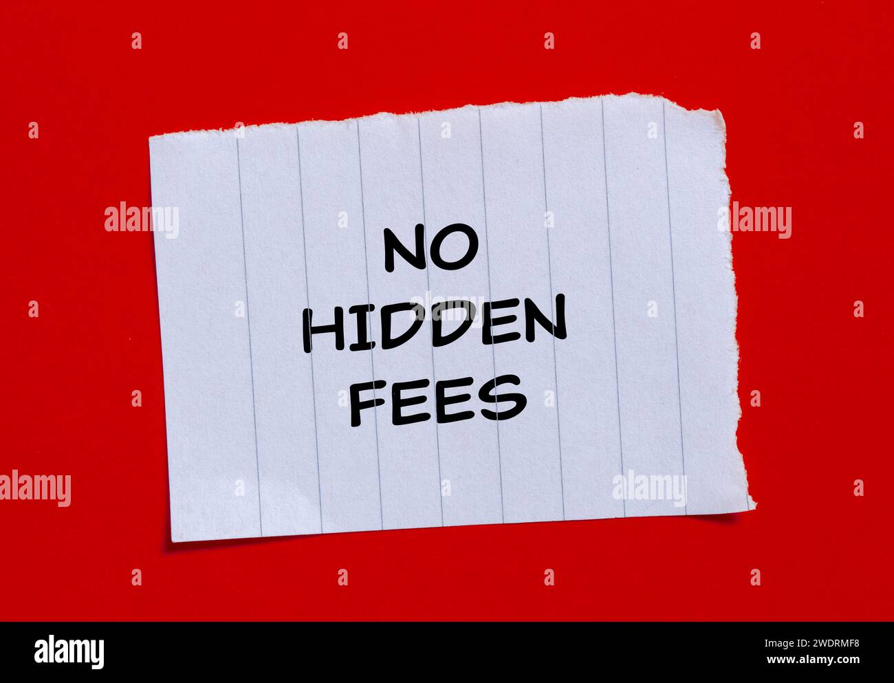 No hidden fees lettering on paper piece with red background. Business ...
