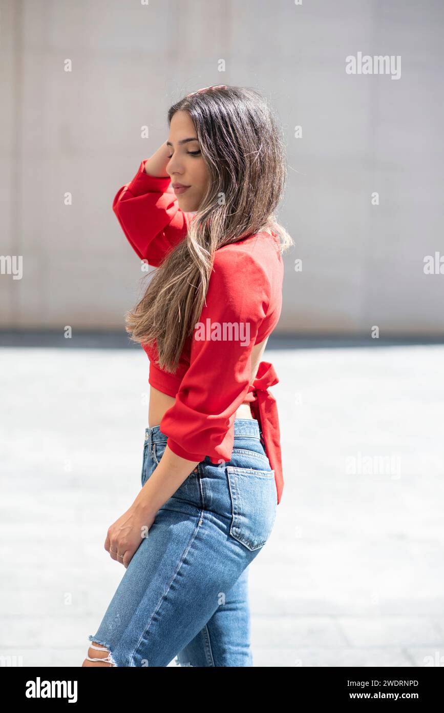 Beautiful woman standing outdoors Stock Photo - Alamy