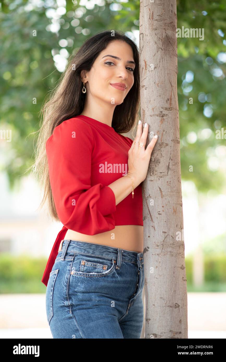 Portrait indian woman against tree hi-res stock photography and images ...