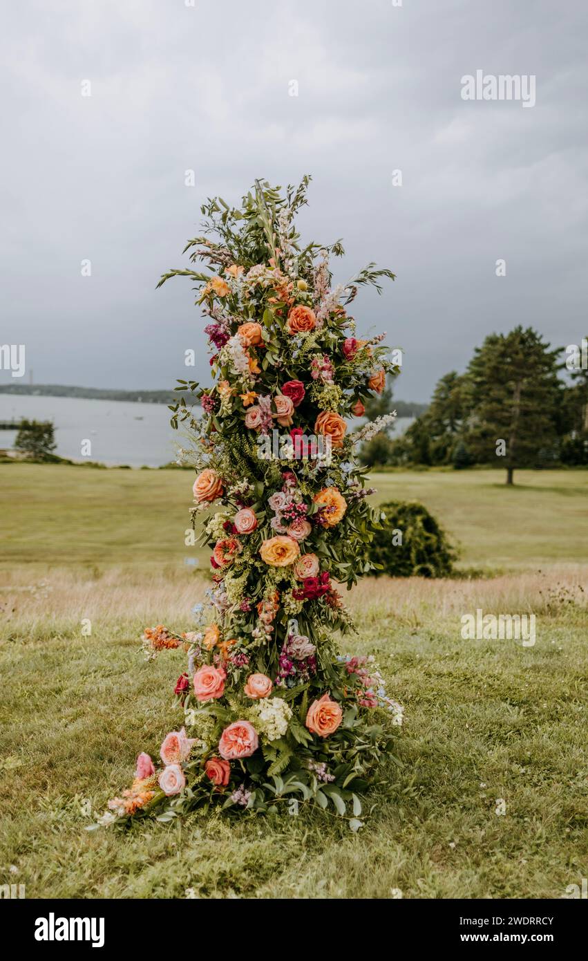 Flower tower in a field at a wedding ceremony Stock Photo - Alamy
