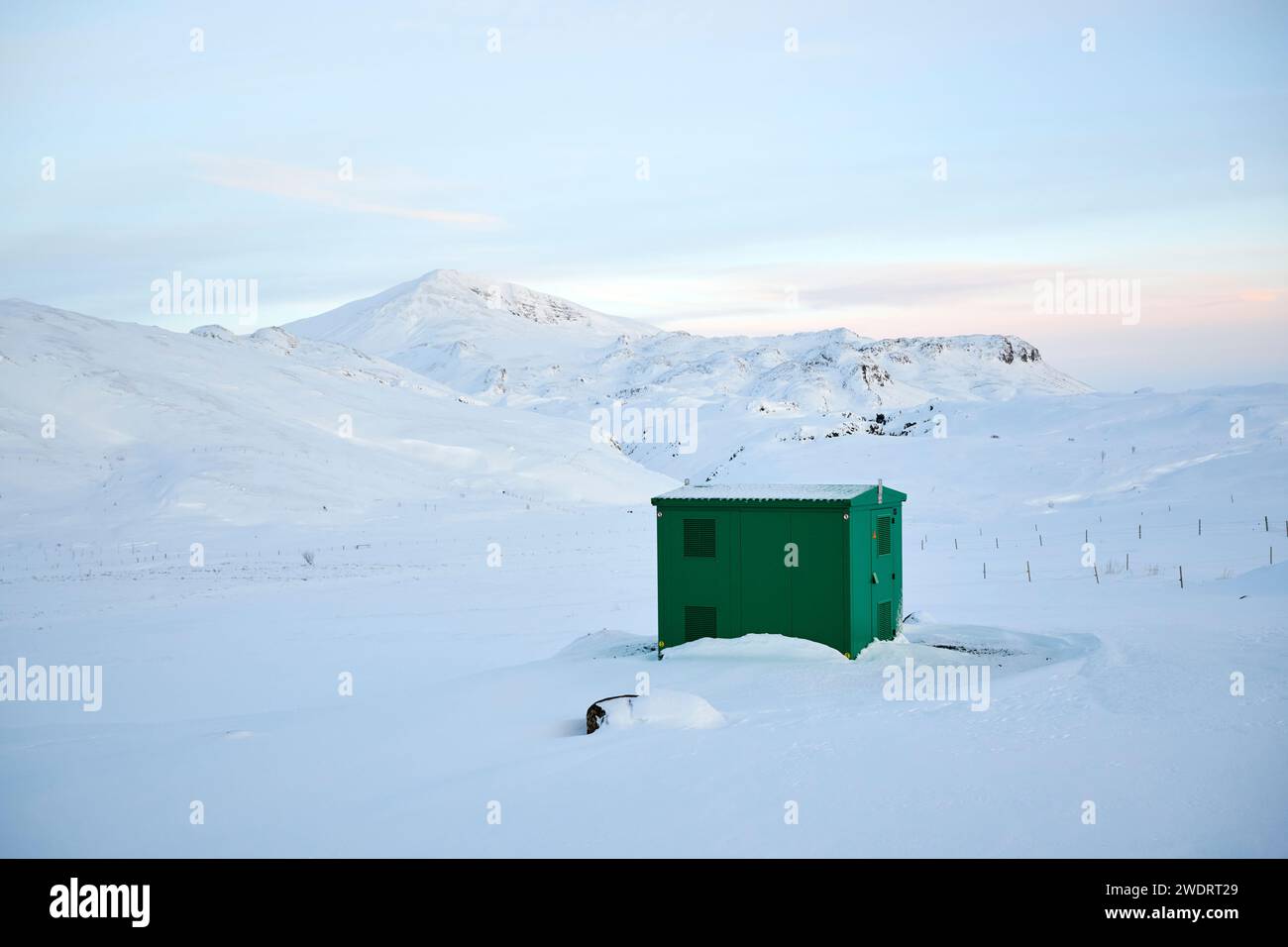 Snow proof metal shed cabin by snowy mountains in winter Stock Photo ...