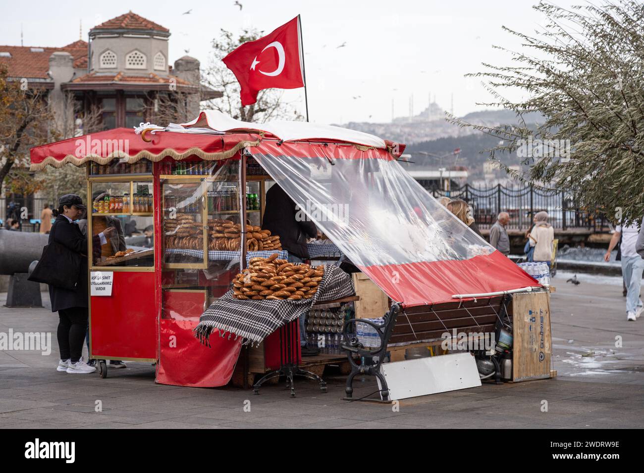 Woman buying traditional turkish sweets at food stall, Istanbul Stock ...