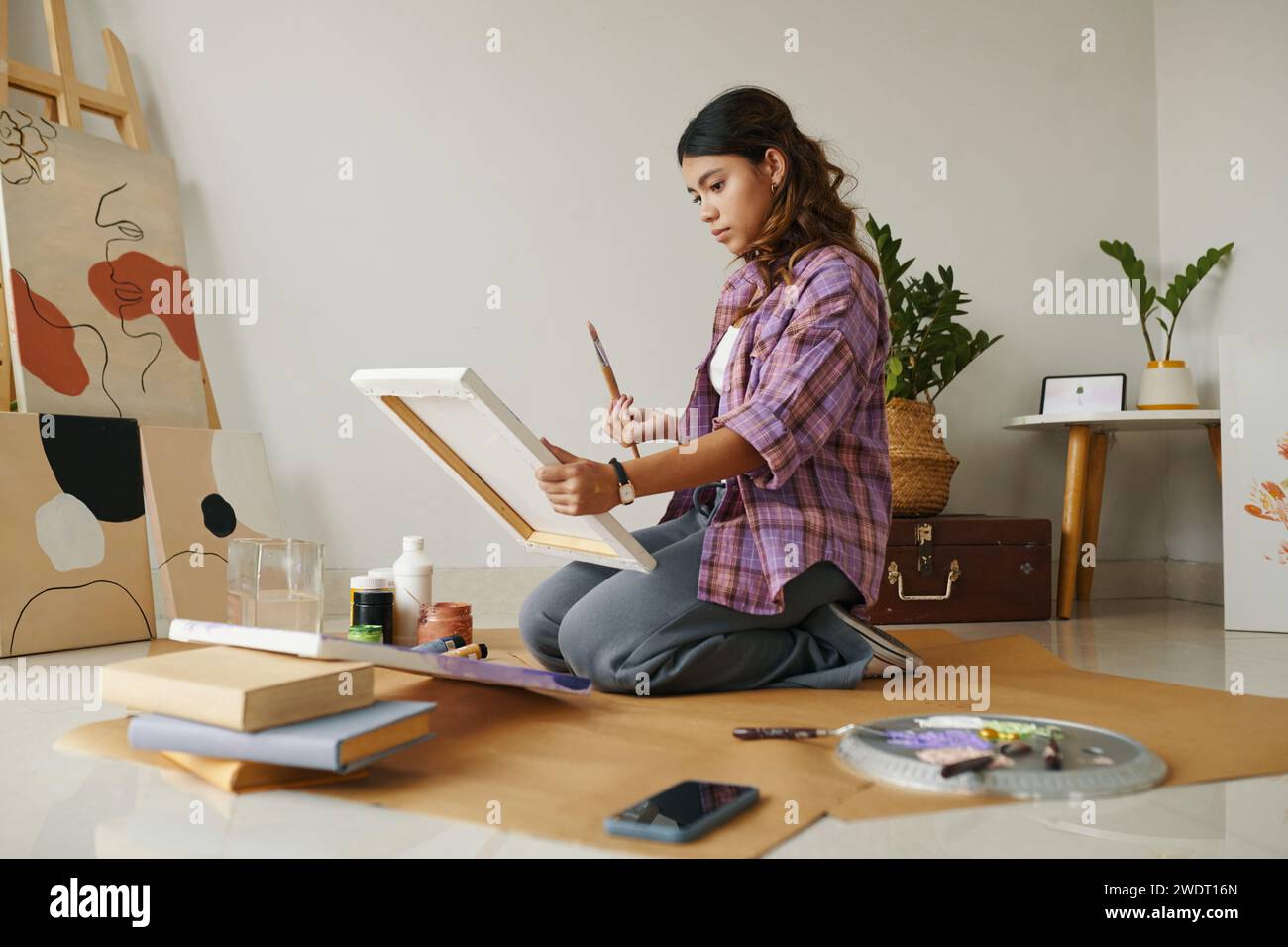 Talented teenage girl painting pictures for her art school Stock Photo ...