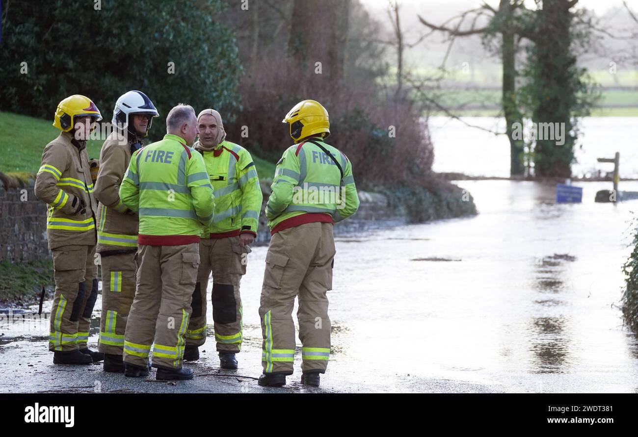 Firefighters in Warwick bridge in Cumbria following flooding in the ...