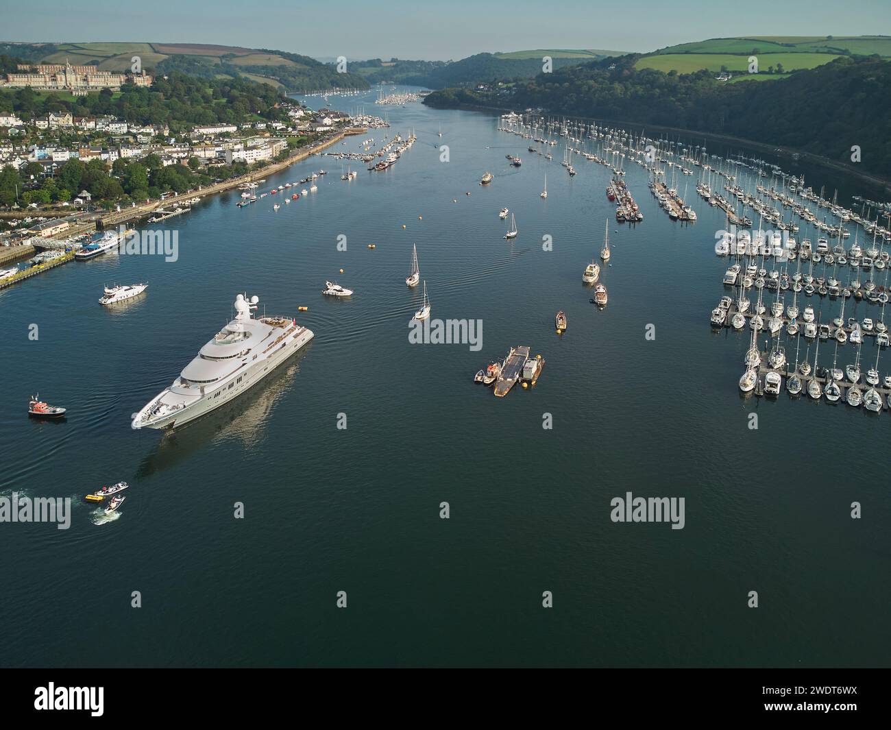An aerial view of the estuary of the River Dart, with the towns of ...