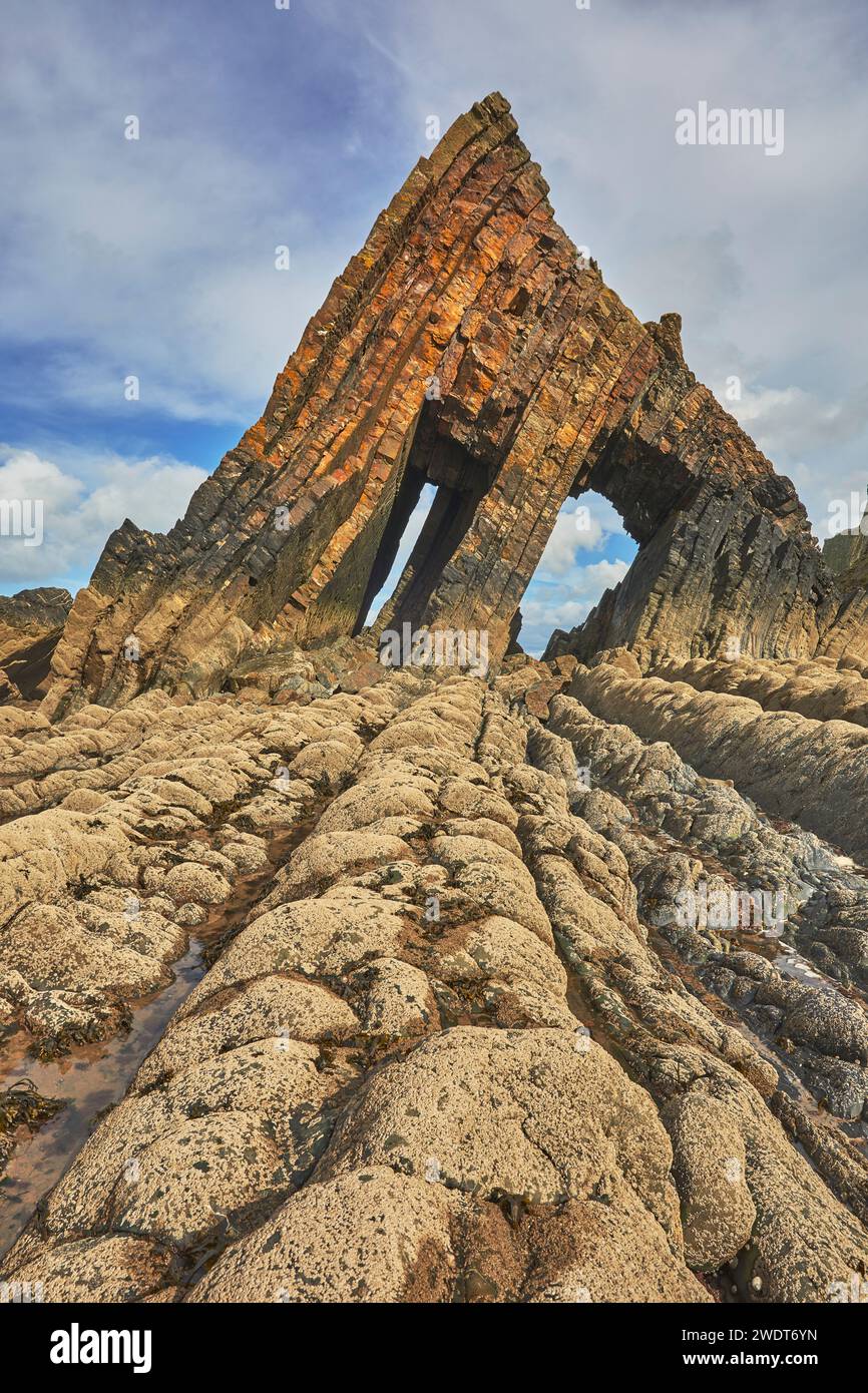 The massive triangle of Blackchurch Rock, on the north coast of Devon ...
