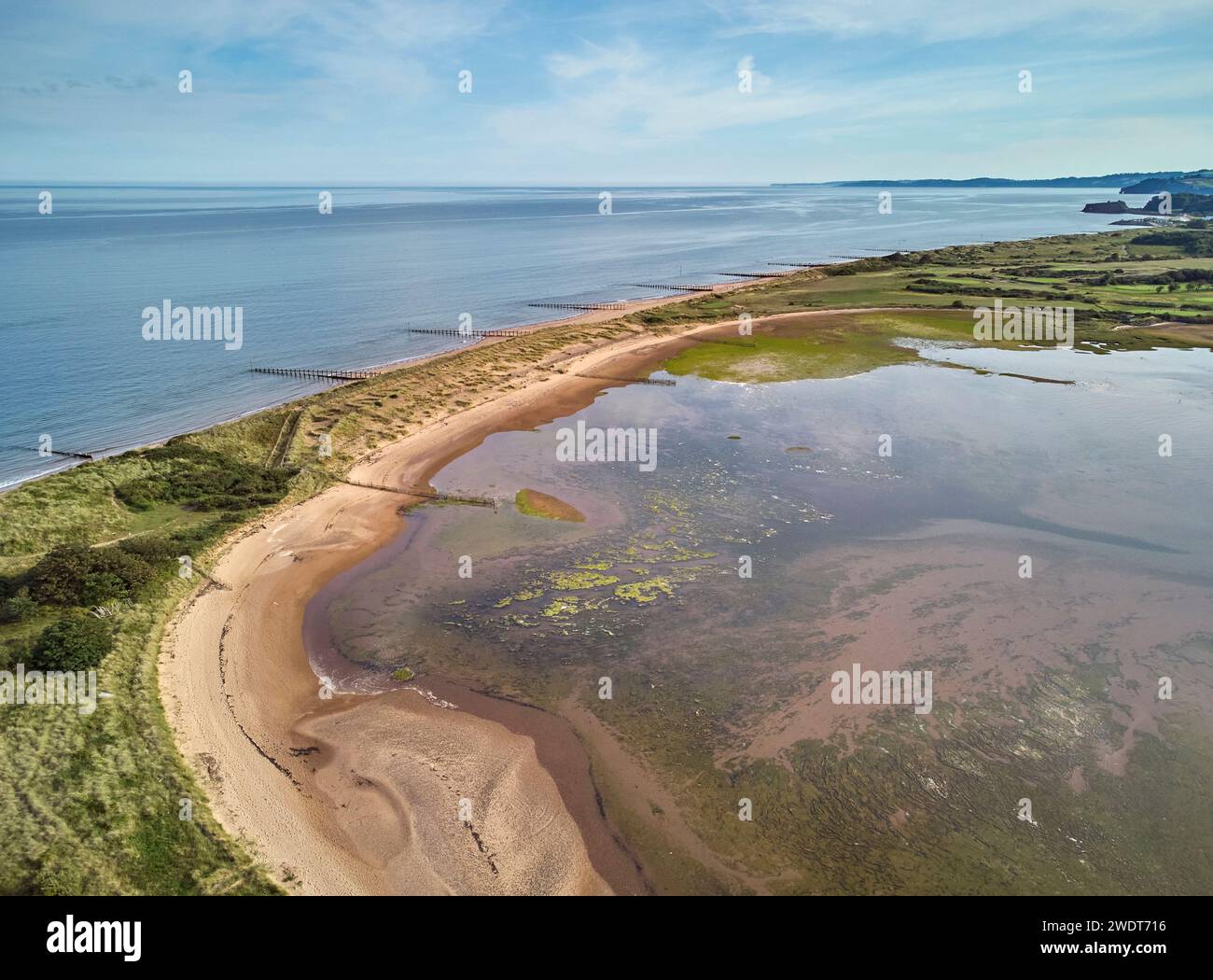 Aerial view of beach and dunes at Dawlish Warren, guarding the mouth of ...