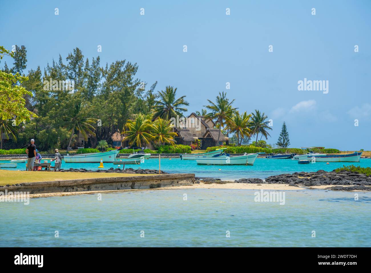View of beach and turquoise Indian Ocean on sunny day in Cap Malheureux ...