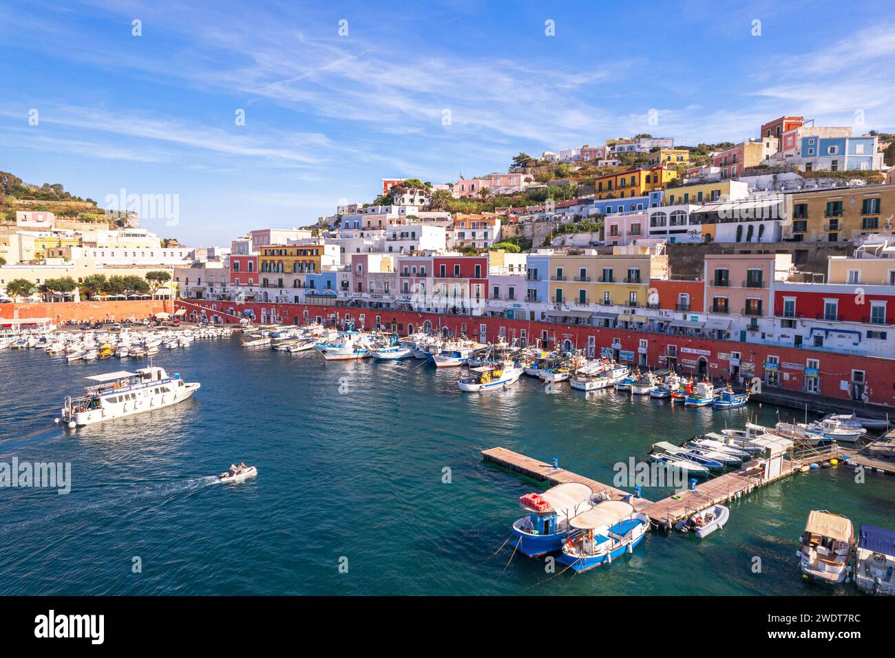 The fishing harbour of the island of Ponza with typical colorful houses ...