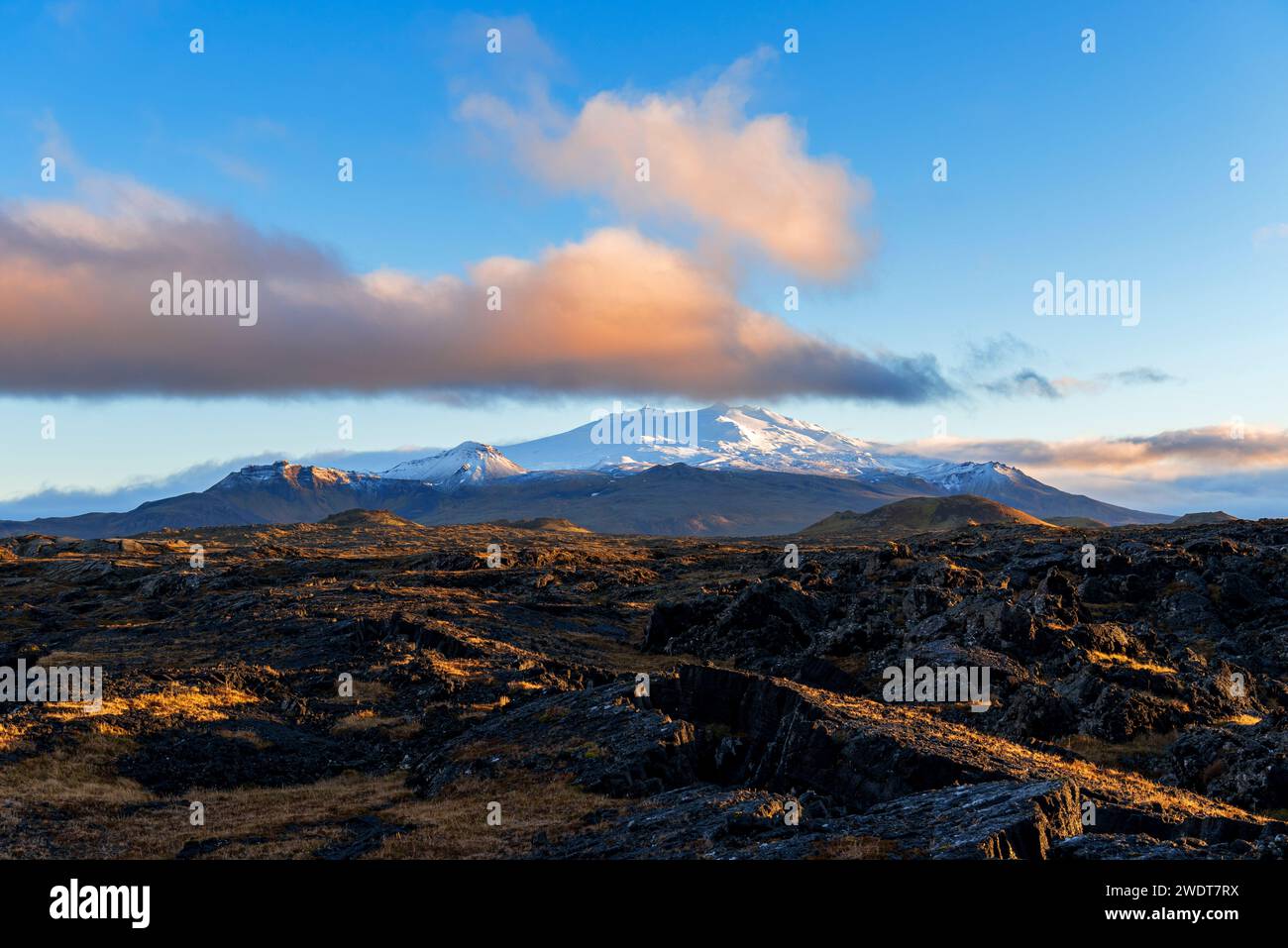 Snaefellsjokull glacier covering the Snaefell volcano seen at sunset ...