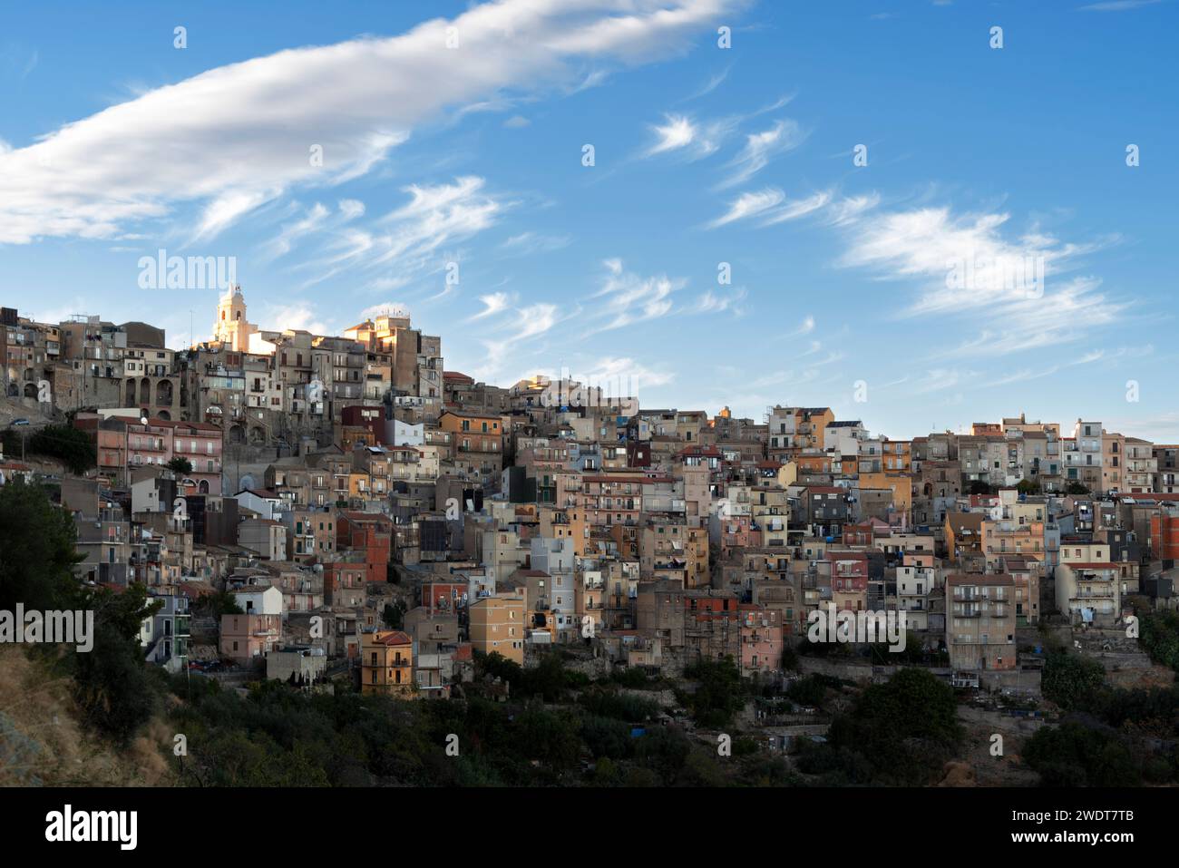 The old traditional village of Centuripe with the church on top of the ...