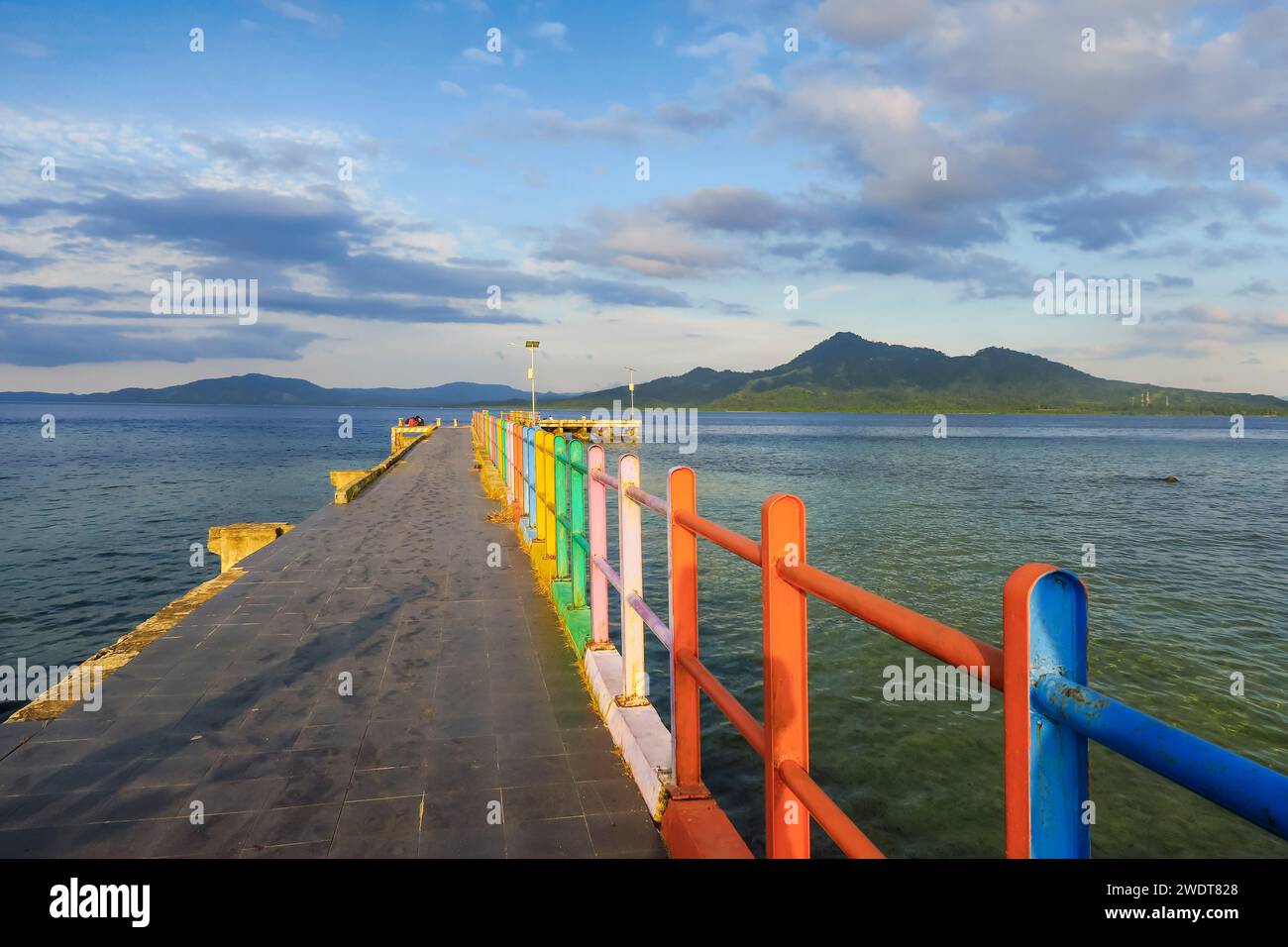 The colourful jetty at this popular coral fringed holiday island and ...