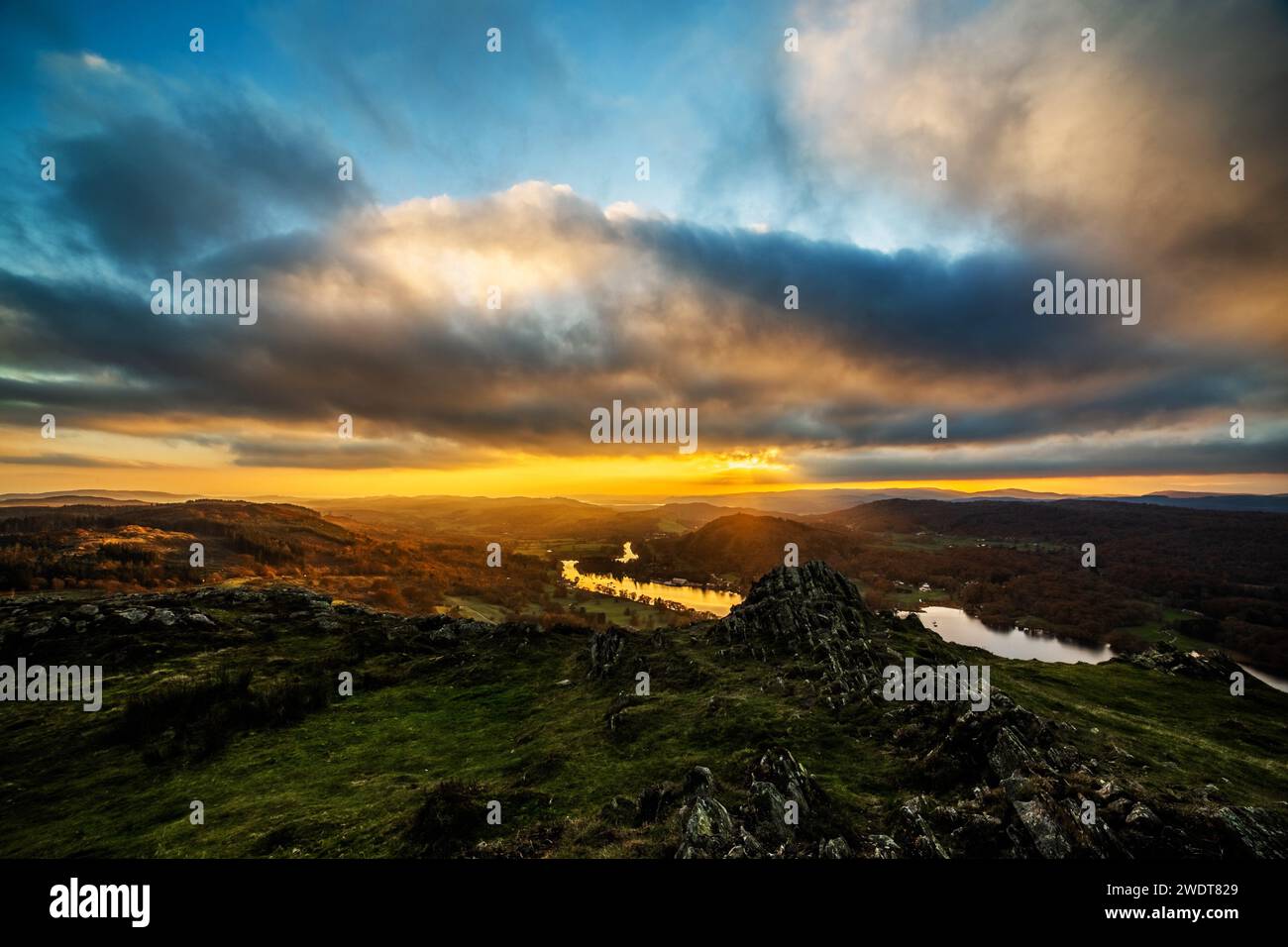 Dramatic sunset from Gummers How and view across Windermere towards the ...