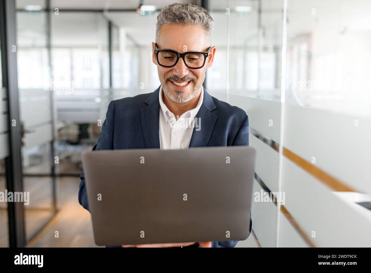 Smart and intelligent senior 60s businessman wearing formal suit and ...