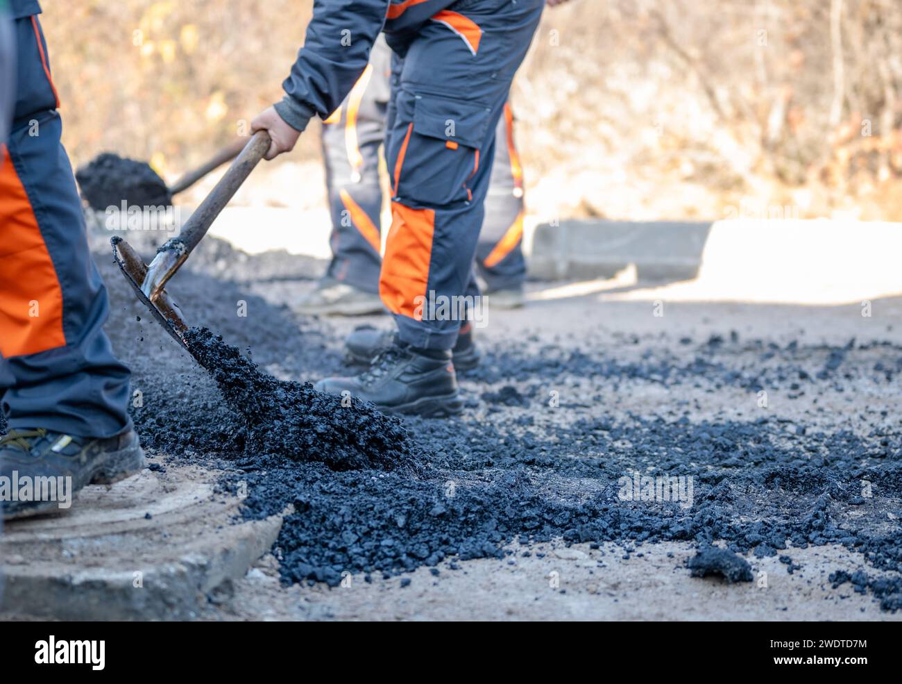 Road Construction Site Stock Photos, Laying new asphalt surface, Heavy ...