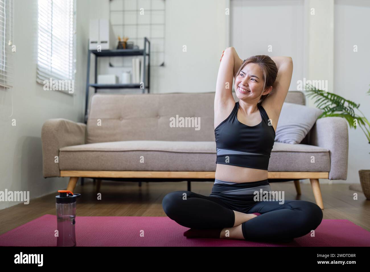 Young asian healthy happy woman workout at home, exercise, doing yoga ...
