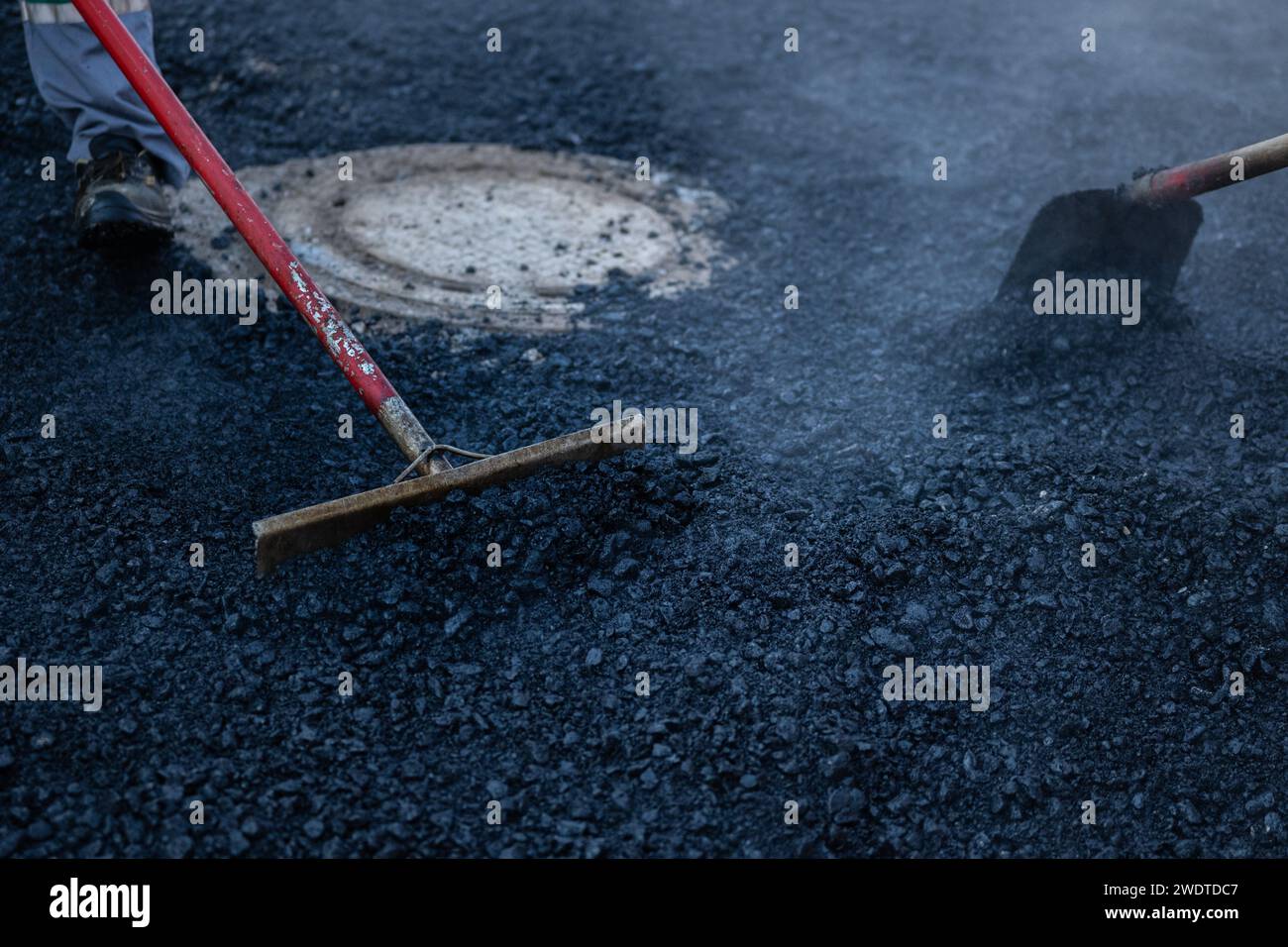 Road Construction Site Stock Photos, Laying new asphalt surface, Heavy ...