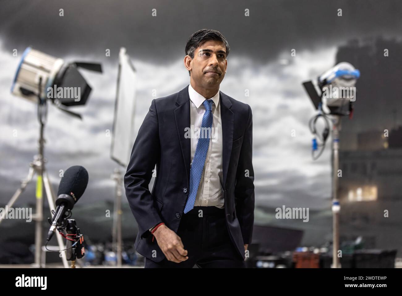 Prime Minister Rishi Sunak speaks to the media in front of a painted ...