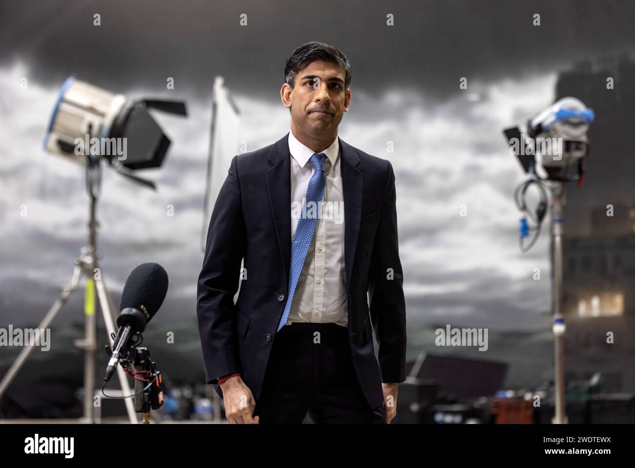 Prime Minister Rishi Sunak speaks to the media in front of a painted ...