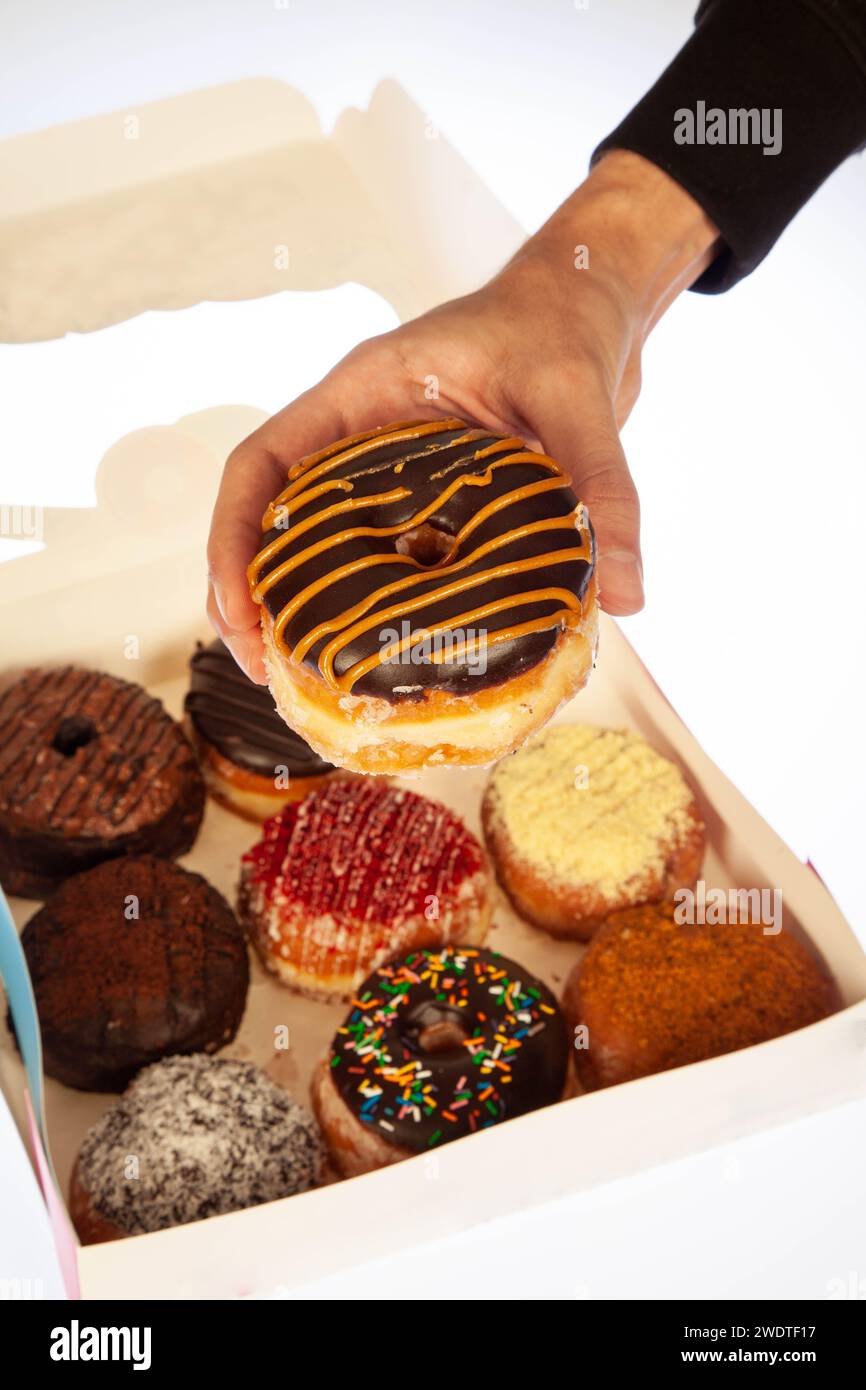 Woman holding brioche pastry hi-res stock photography and images - Alamy
