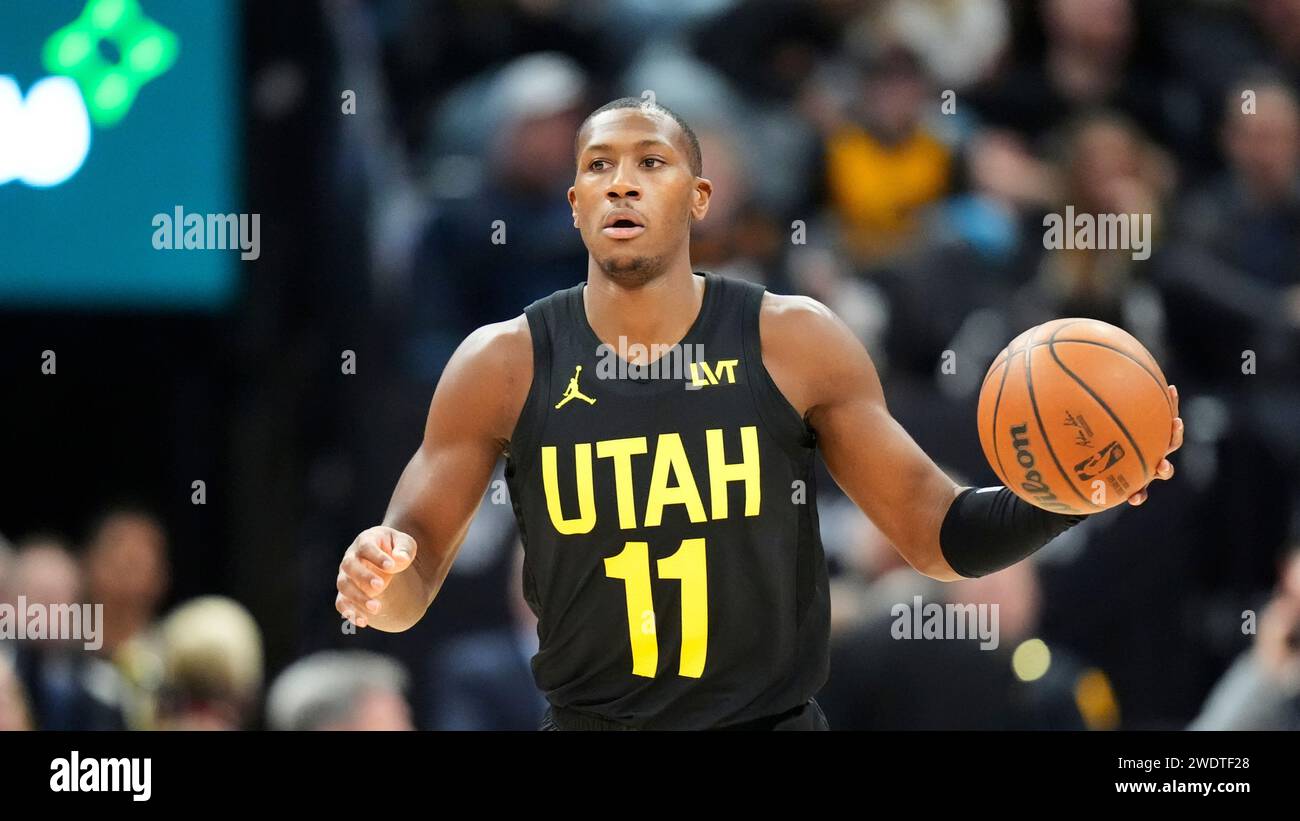 Utah Jazz guard Kris Dunn (11) brings the ball up court during the ...