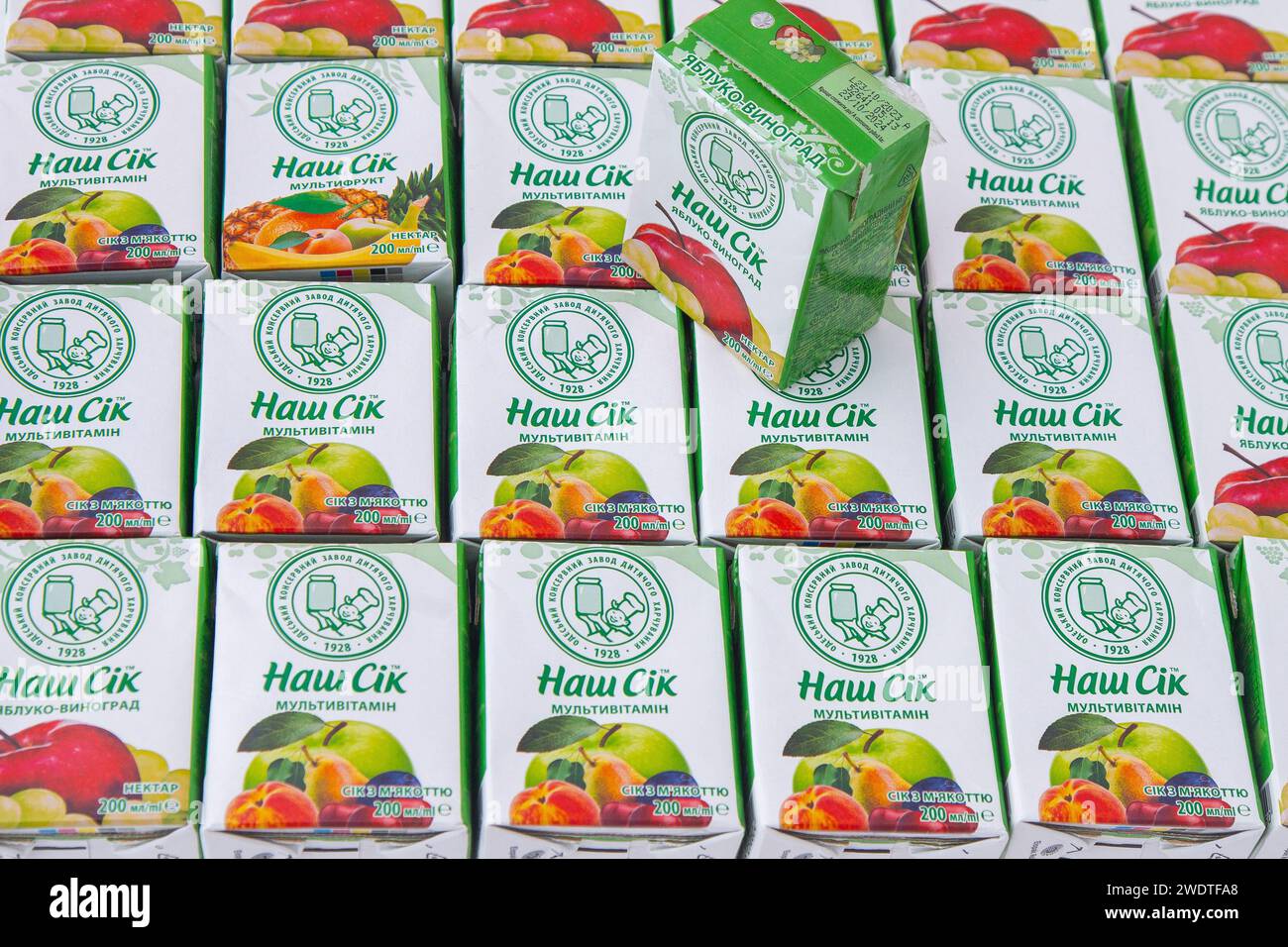 Children's juice in a tetra pack Sadochok. Odesa baby food factory logo ...