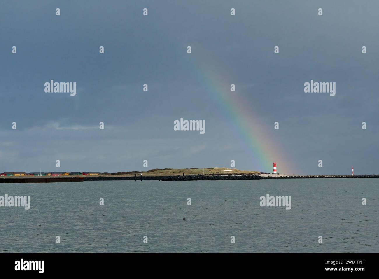 Rainbow over Little Lighthouse Stock Photo - Alamy
