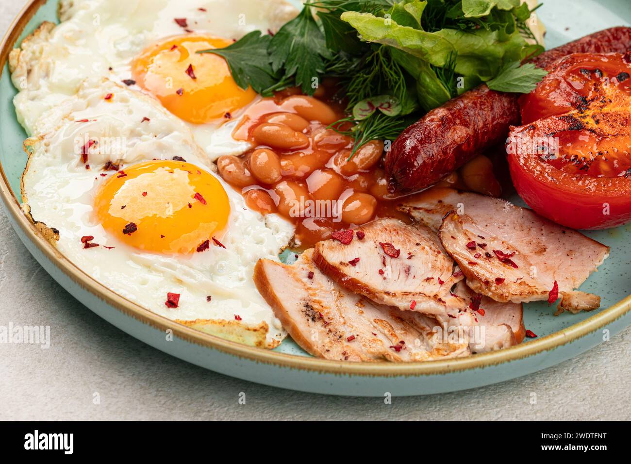 Portion of classic british breakfast with beans Stock Photo - Alamy