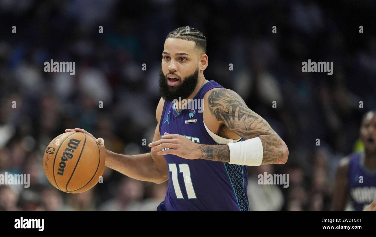Charlotte Hornets forward Cody Martin brings the ball down court ...