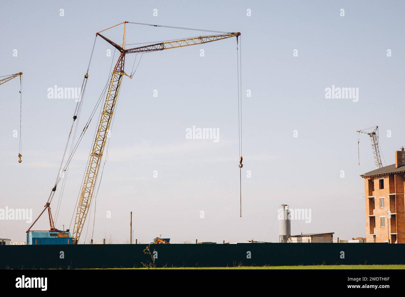 crane house construction and repair. High quality photo Stock Photo - Alamy