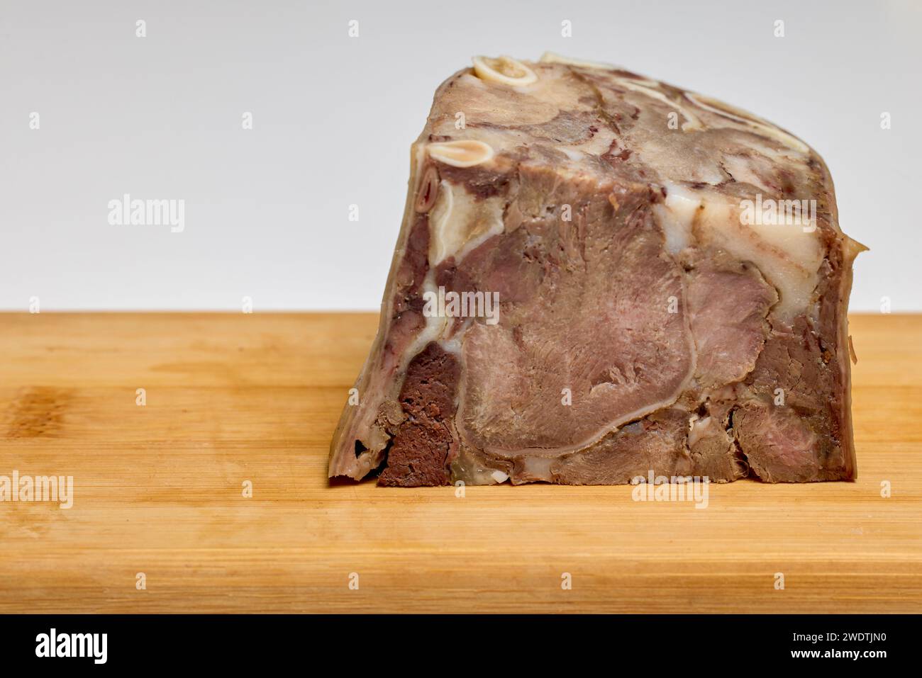 (Toba), traditional Romanian food product on a wooden chopper made with ...